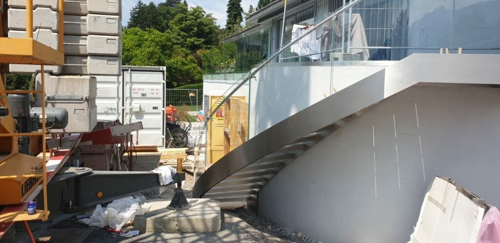 Curved Metal Staircases Bespoke Designs With Glass Balustrades